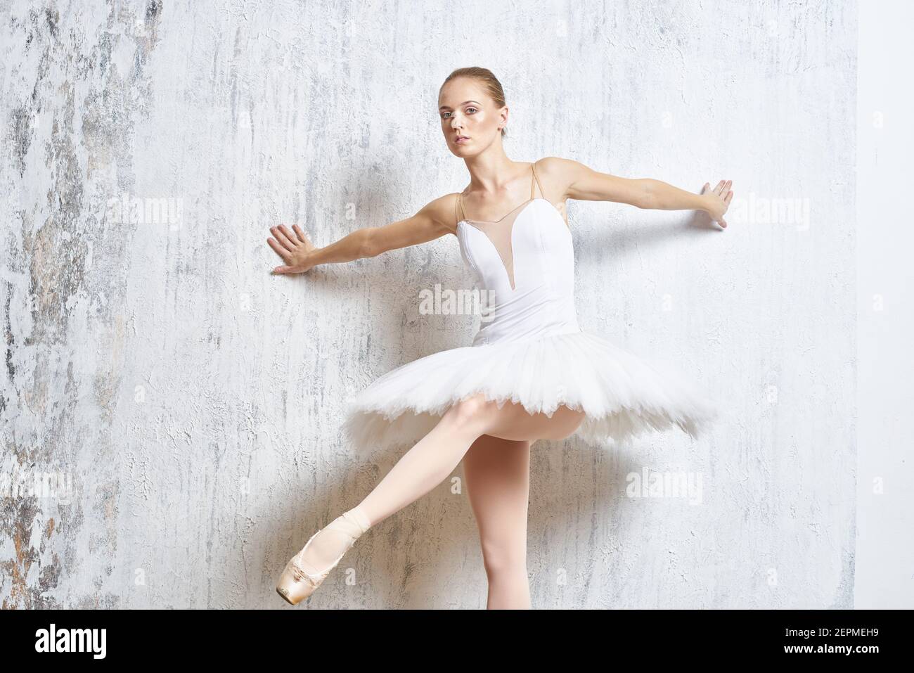 Legs ballerina pointe shoes white tutu performance Stock Photo - Alamy