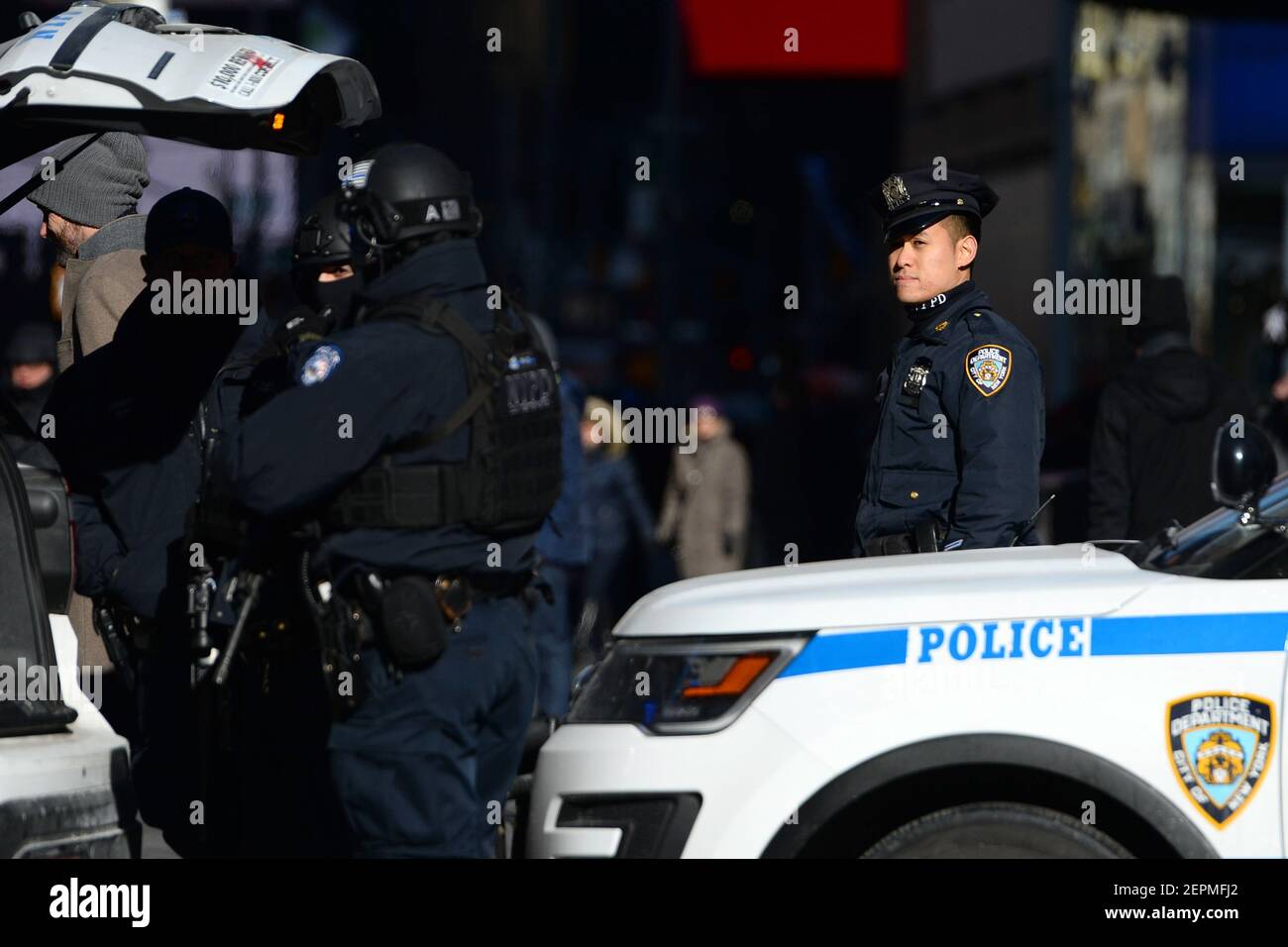 New York City Police officers patrol Times Square as New York City ...