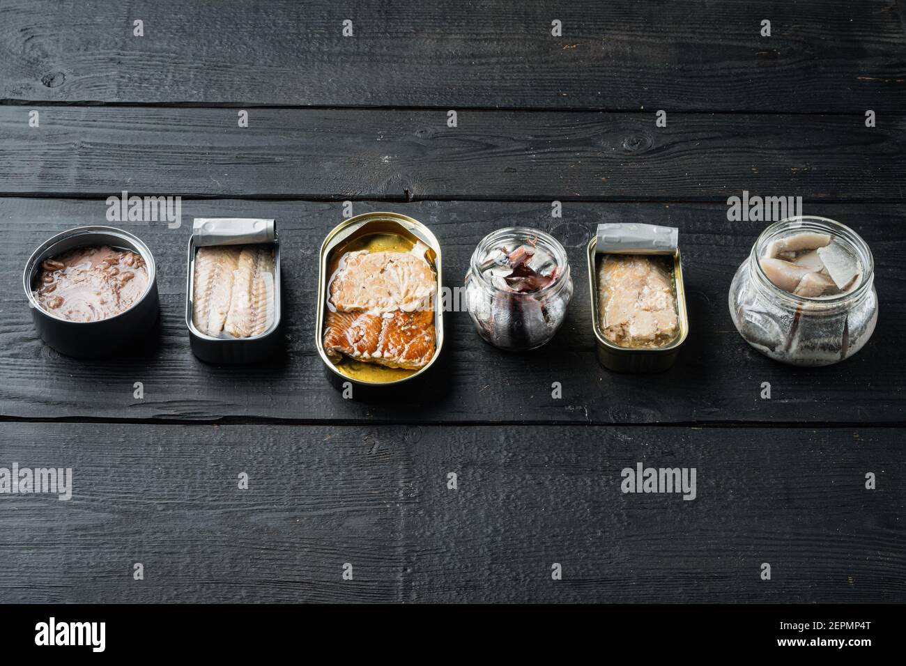 Canned fish with different assortment types of seafood set, on black ...