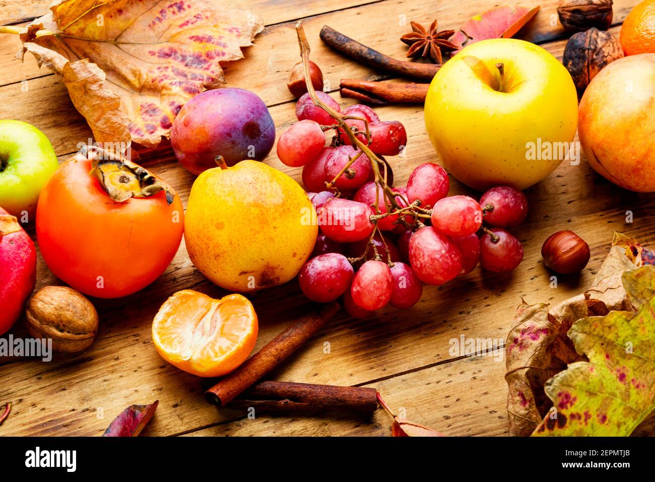 Assortment of fruits,grapes and nuts.Autumn fruits.Autumn seasonal ...