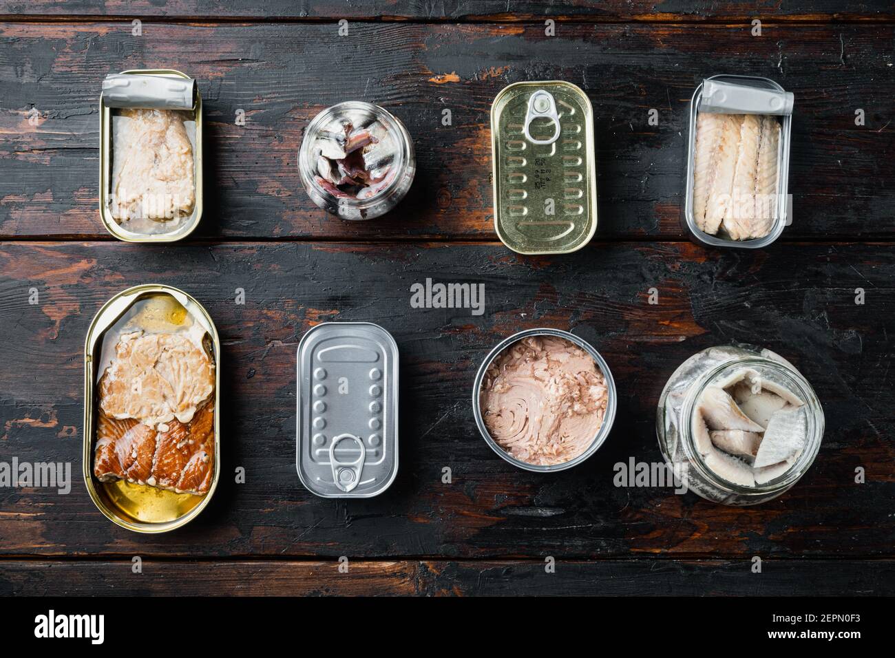 Assortment of cans of canned with different types of fish set, on old ...