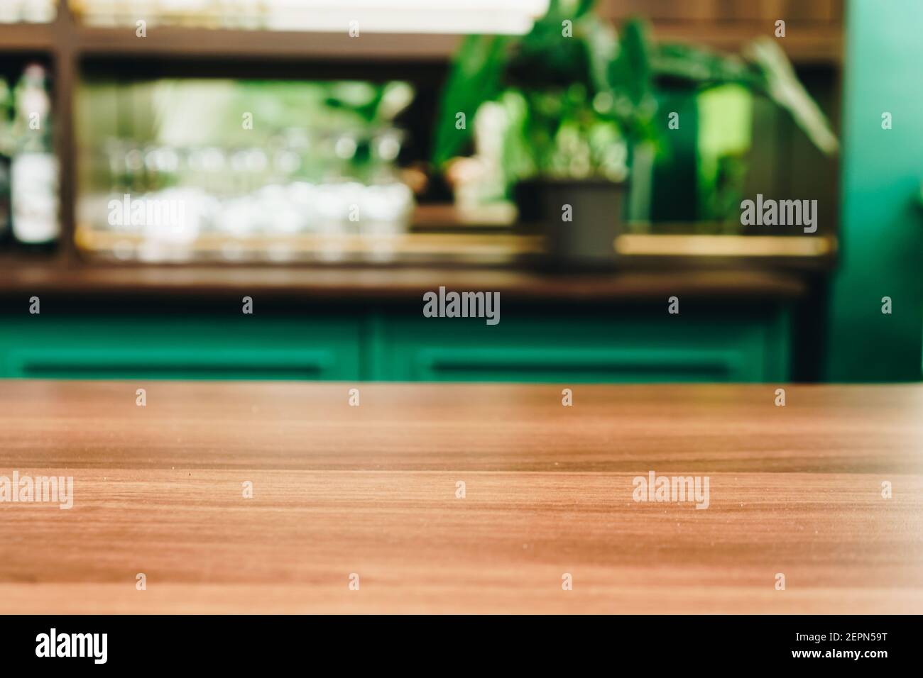 Selective focus of wooden table with blur coffee and restutant cafe ...