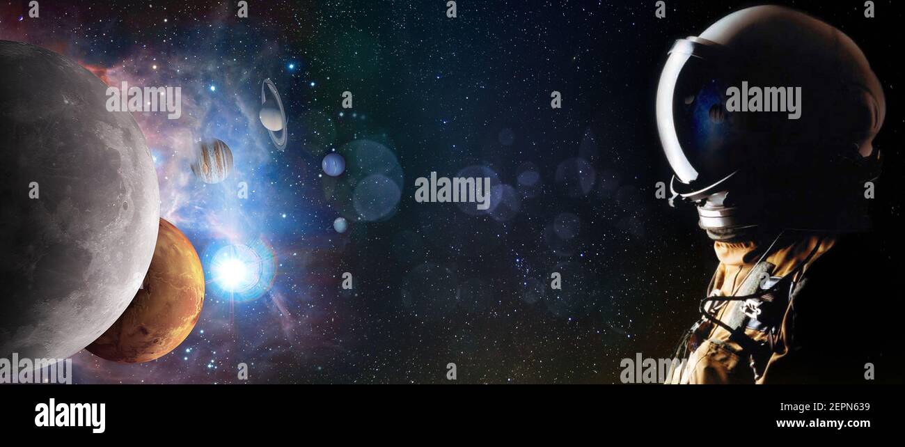 Concept of an astronaut looking up into the stars and solar system ...