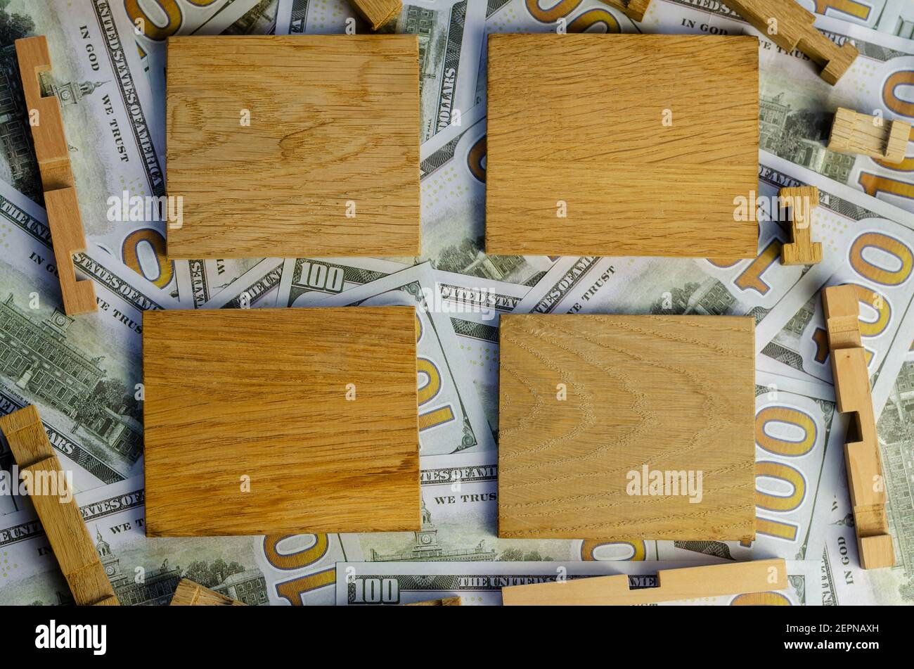 Money, rectangular boards and a wooden construction puzzle for children ...