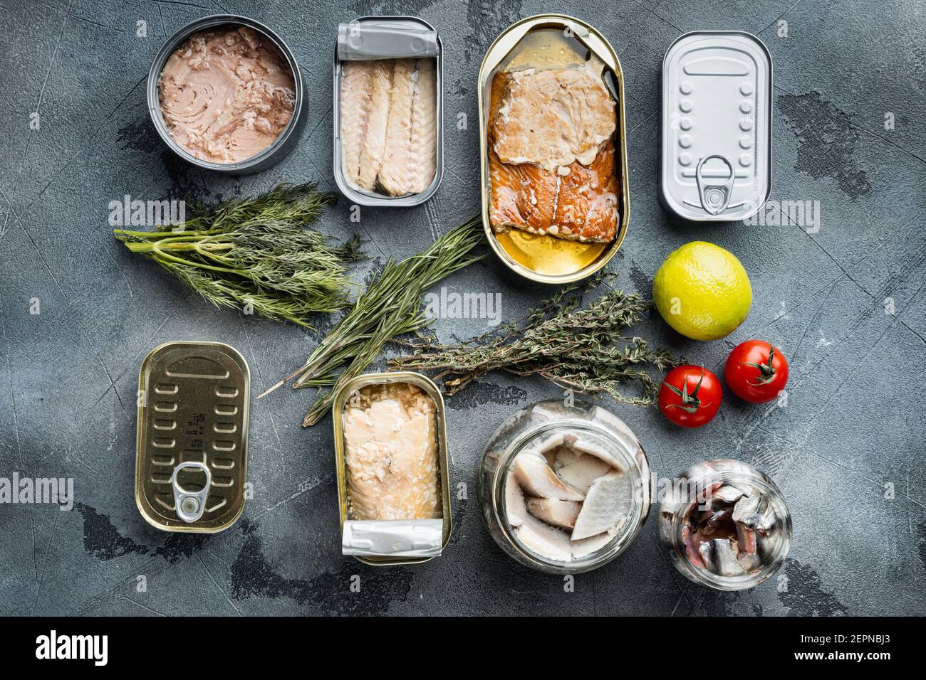 Assortment of cans of canned with different types of fish set, on gray ...