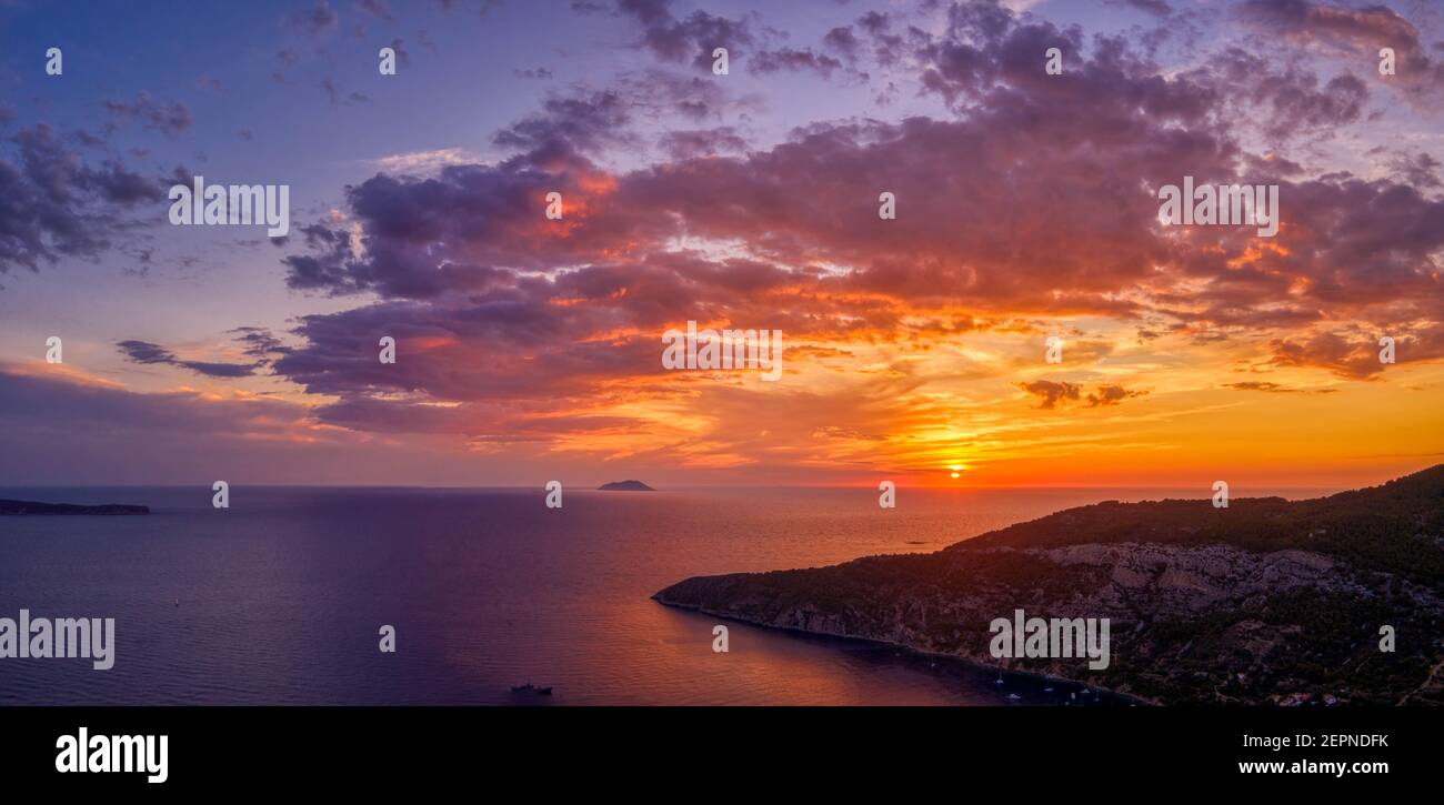 Aerial panoramic drone shot sunset over Adriatic horizon from Komiza ...