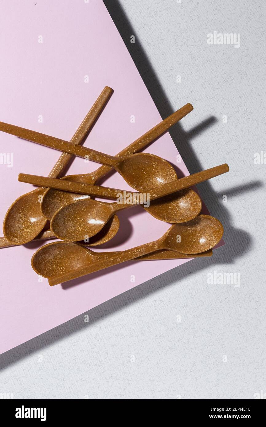 Plastic spoons white brown hi-res stock photography and images - Alamy