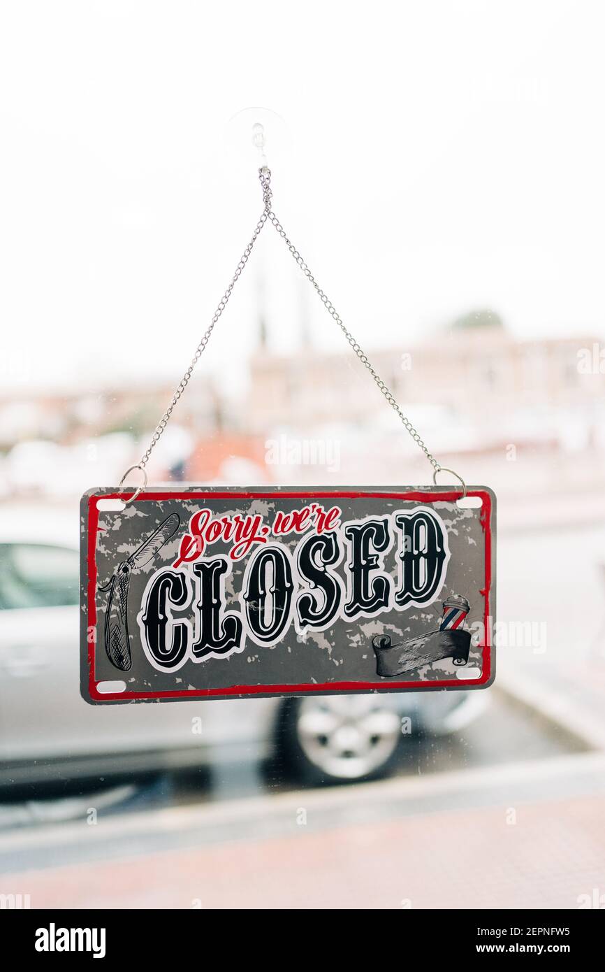 Signboard inscription sorry closed hi-res stock photography and images ...