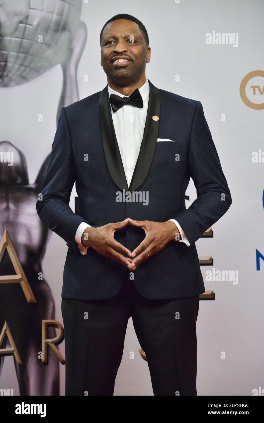 President and CEO of the NAACP Derrick Johnson poses in the press room ...
