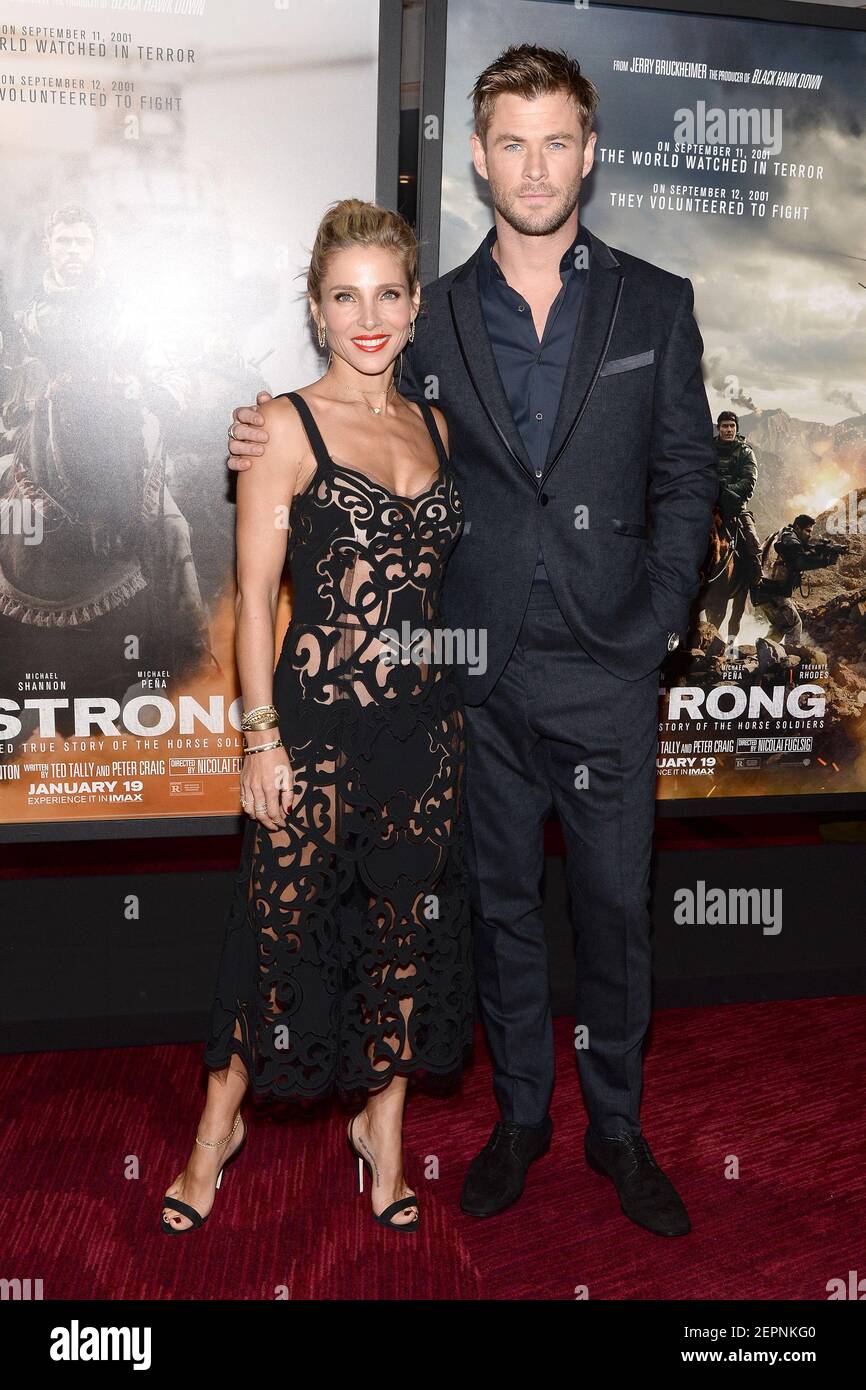(L-R) Elsa Pataky and Chris Hemsworth attend the world premiere of '12 ...