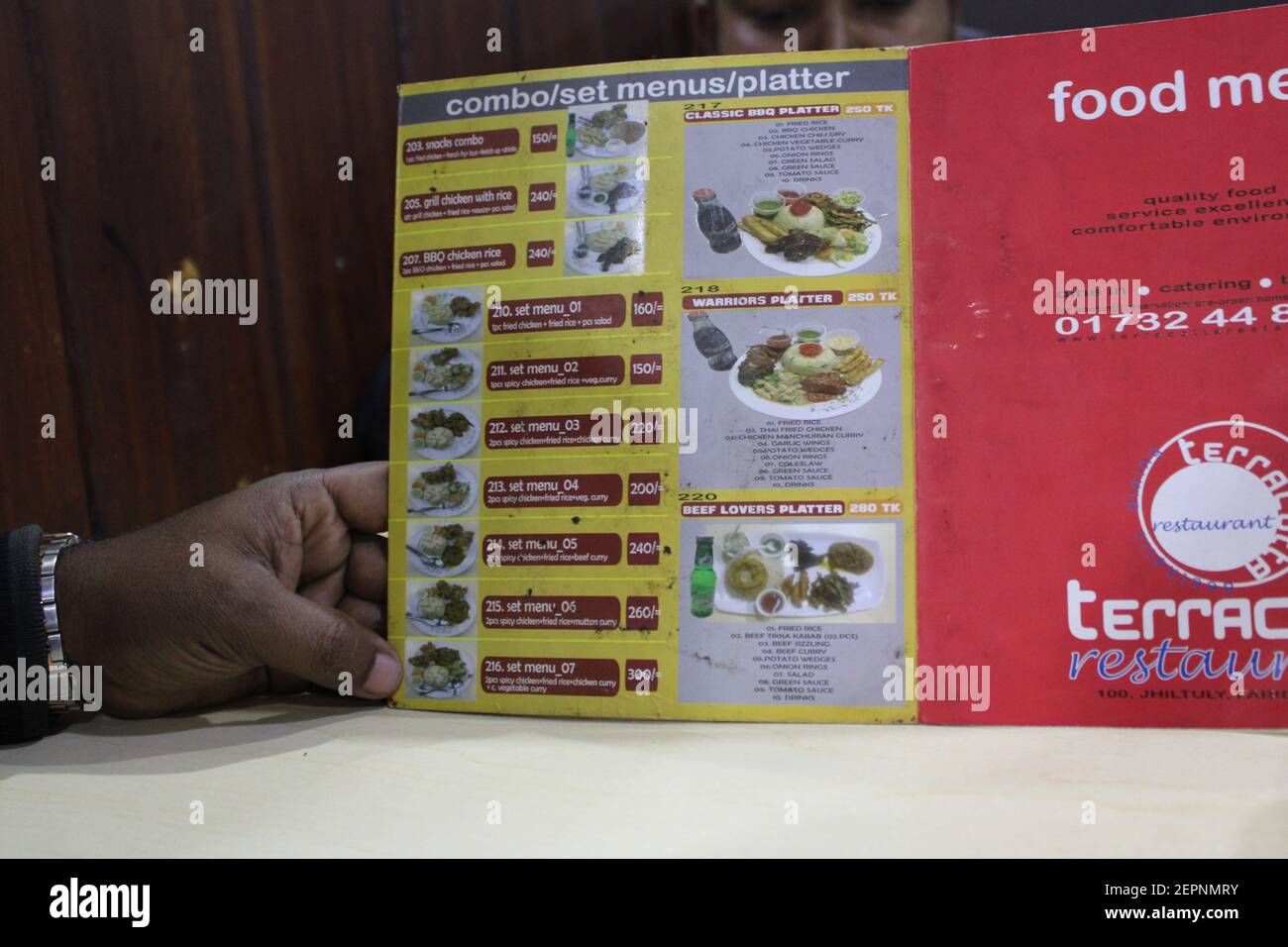 Female customer read menu hi-res stock photography and images - Alamy