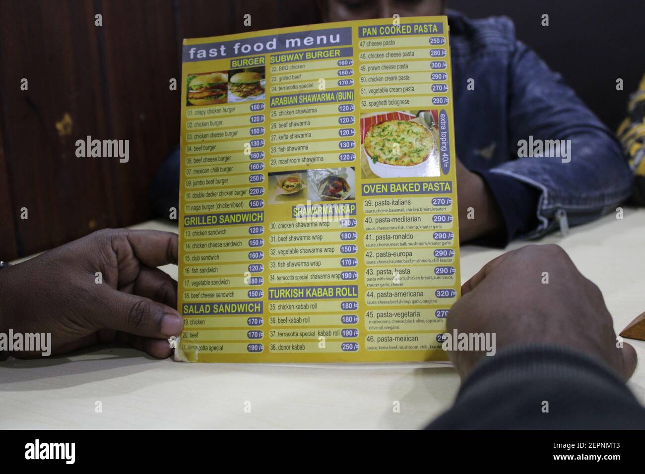 Restaurant order menu book customer hand photo from Bangladesh Stock ...