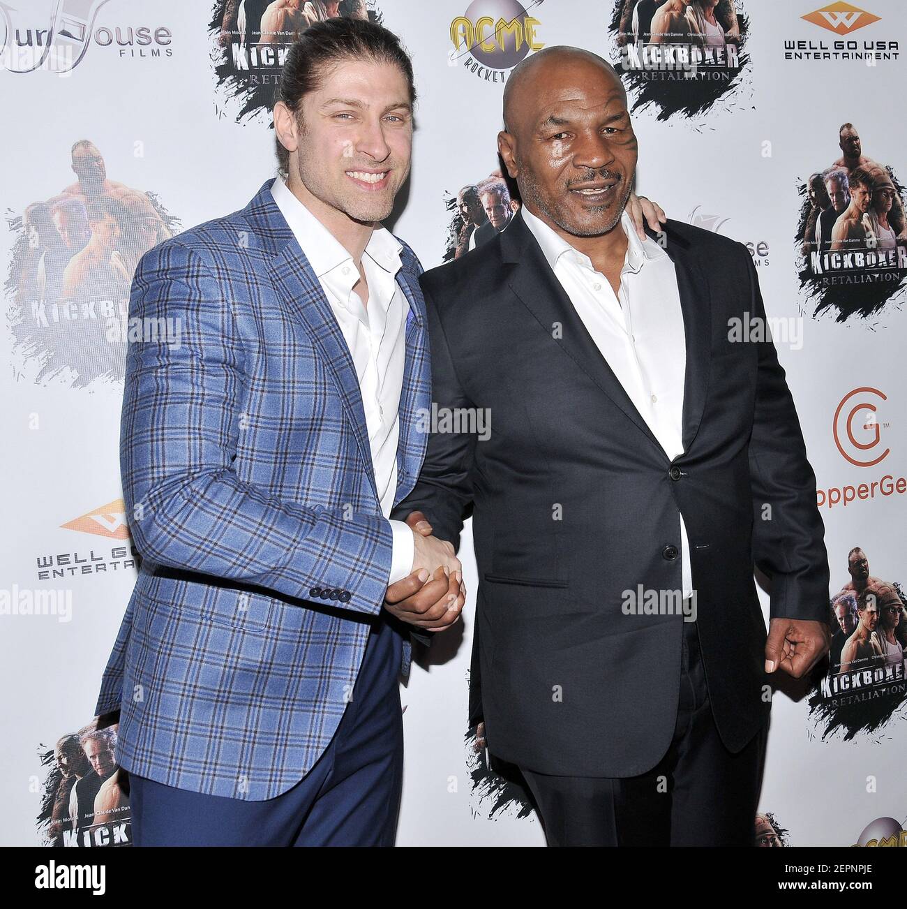 (L-R) Alain Moussi and Mike Tyson arrives at the "Kickboxer ...