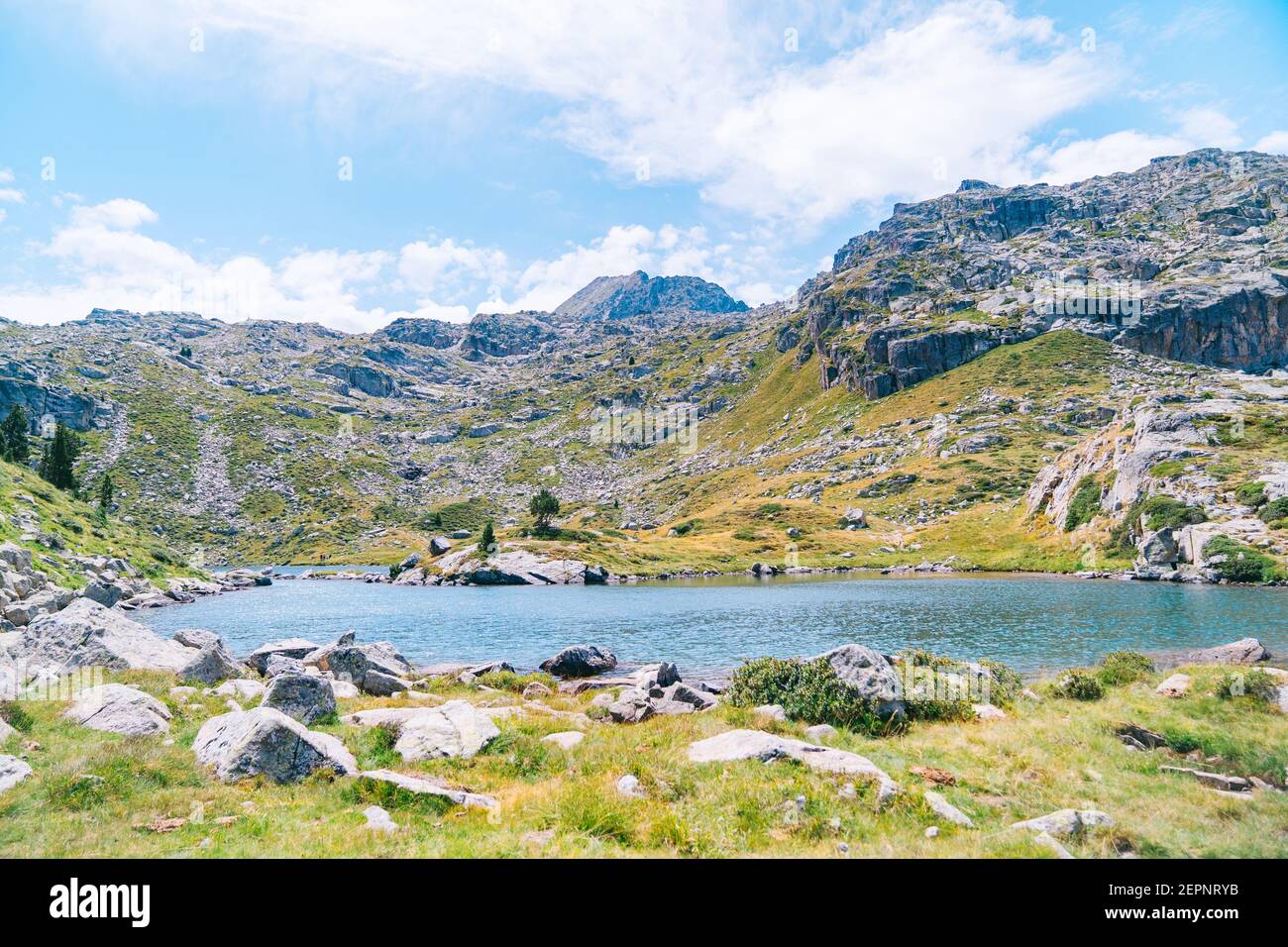 Magnificent landscape of rough rocky mountain range surrounding calm ...