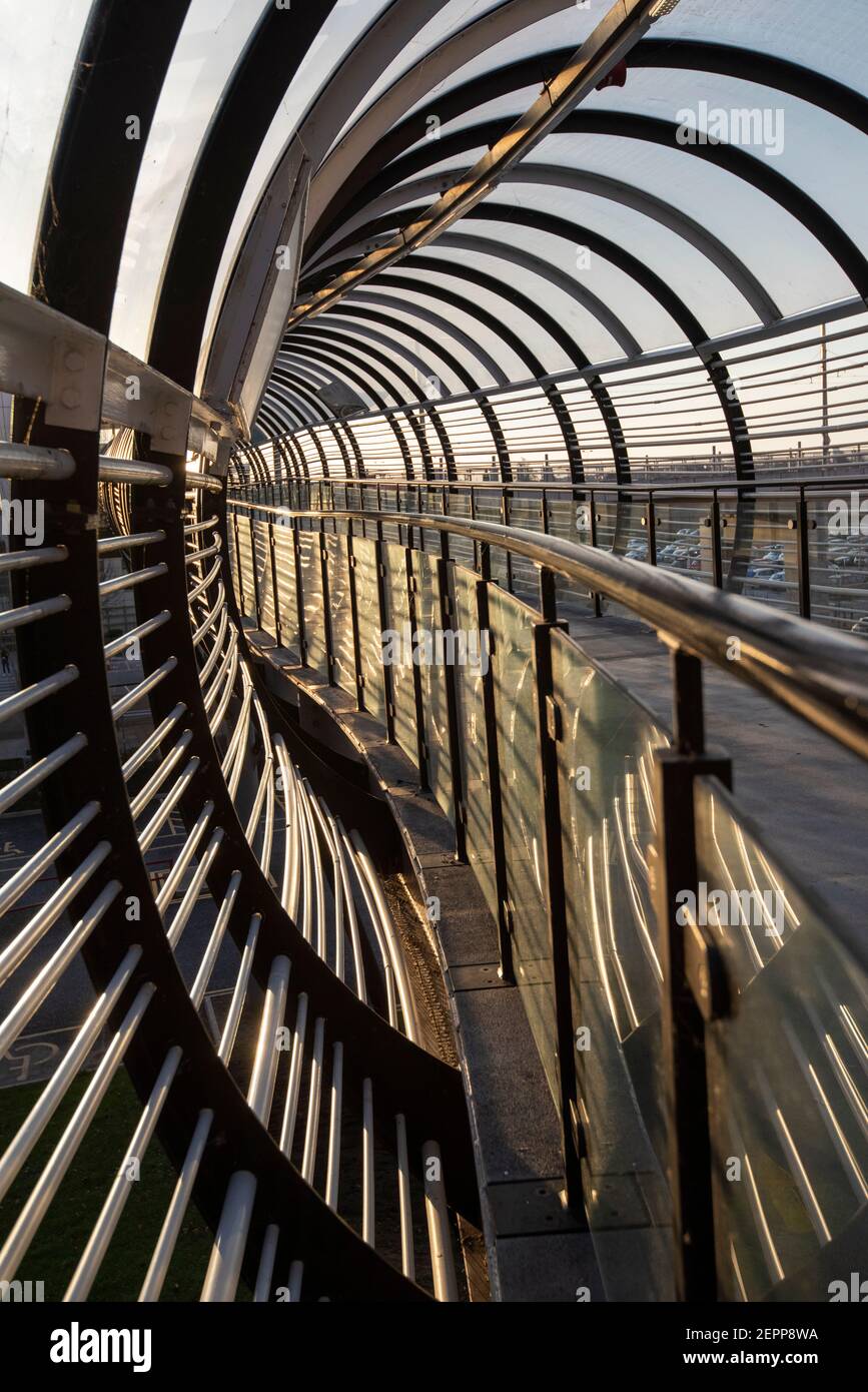 Morning light on the Sir Peter Mansfield tram bridge at the Queens ...