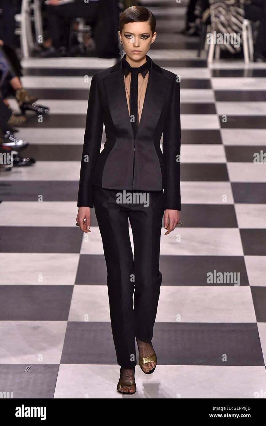 Model Loane Normand walks on the runway during the Dior Haute Couture ...