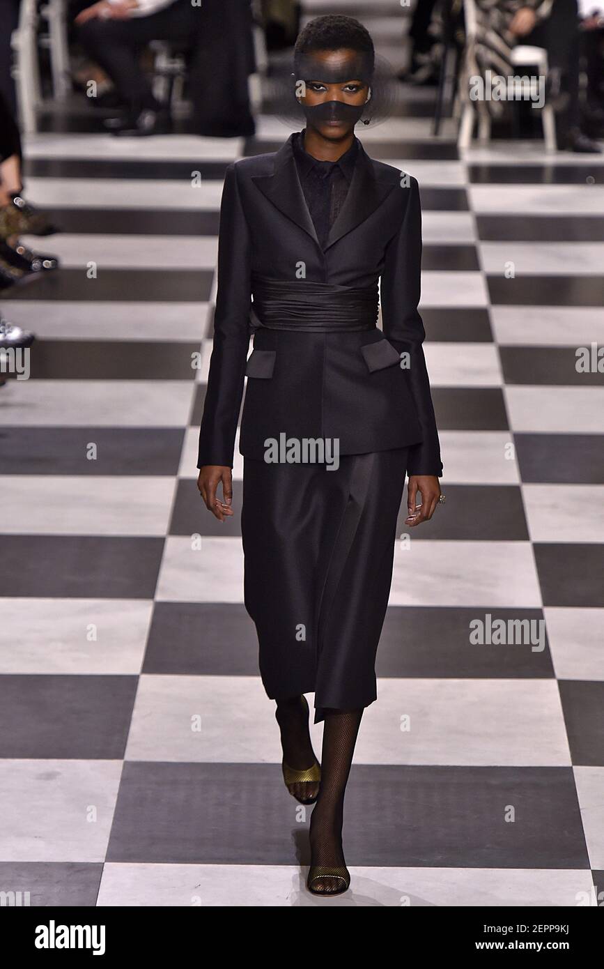 Model Oumie Jammeh walks on the runway during the Dior Haute Couture ...