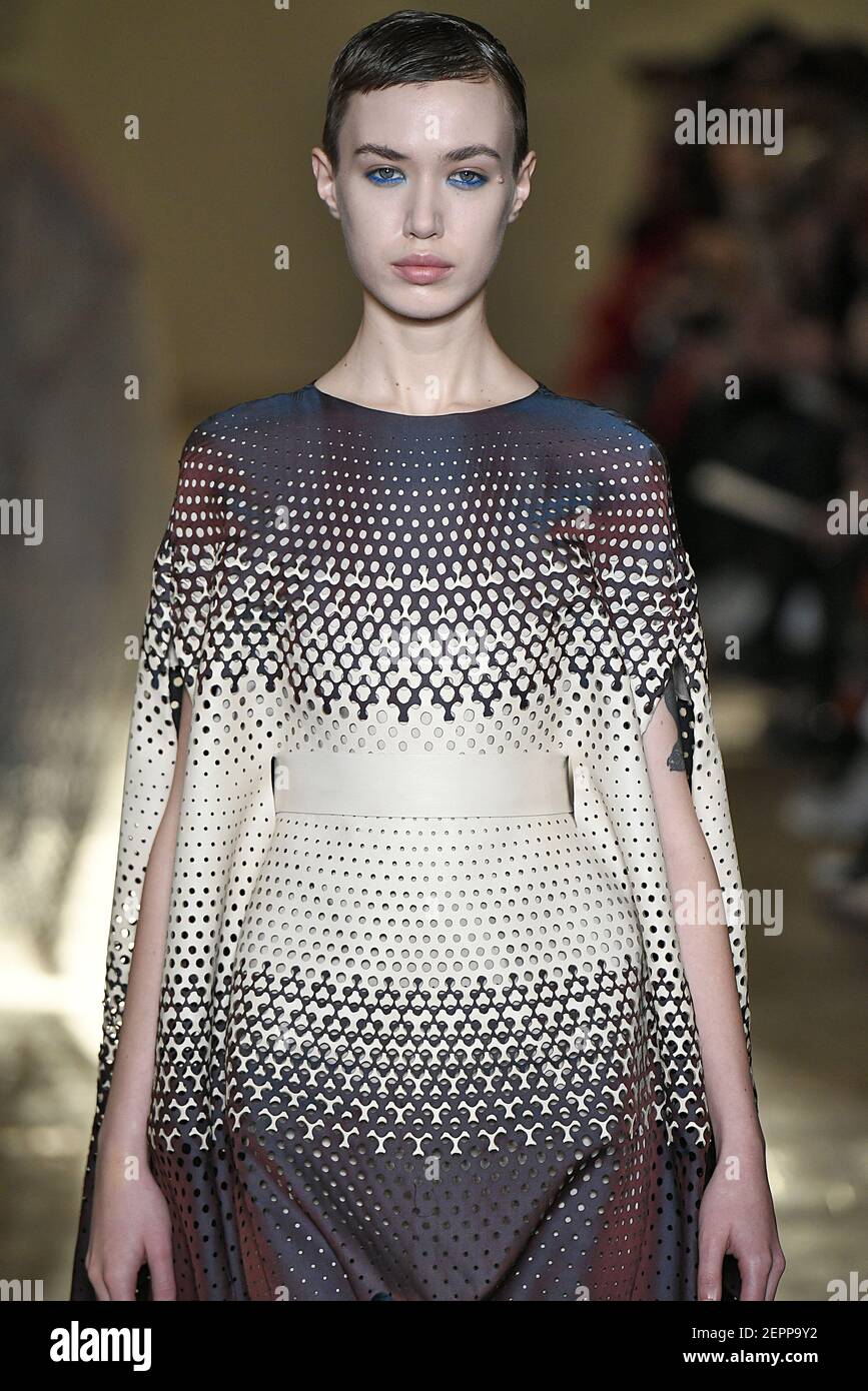 Model Meg Fairbairn walks on the runway during the Iris Van Herpen ...