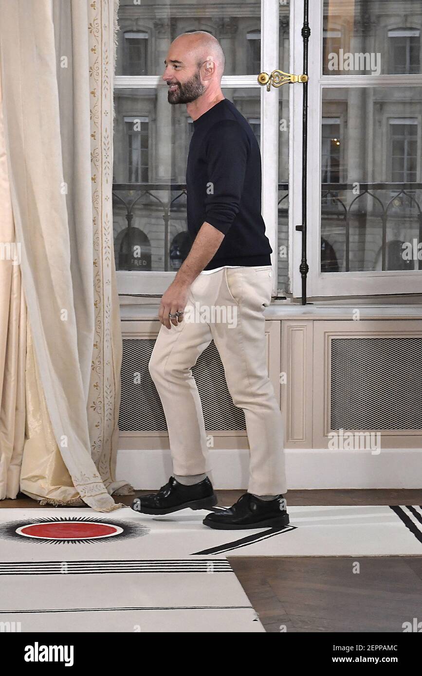 Designer Bertrand Guyon walks on the runway during the Schiaparelli ...