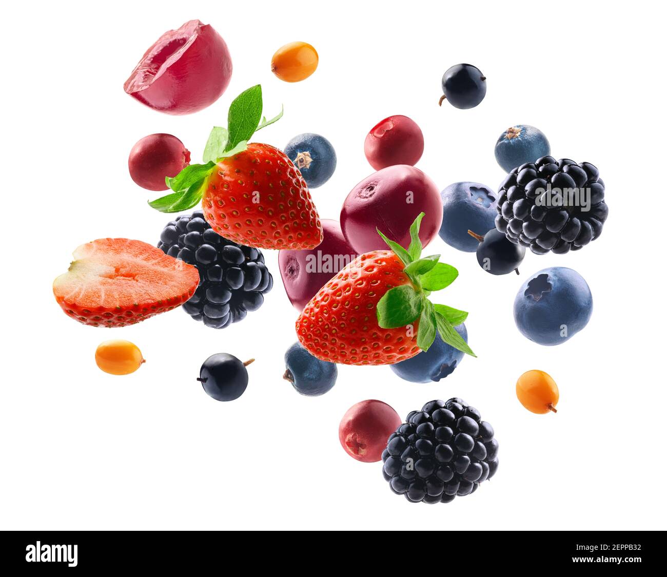 Many different berries in the form of a frame on a white background ...