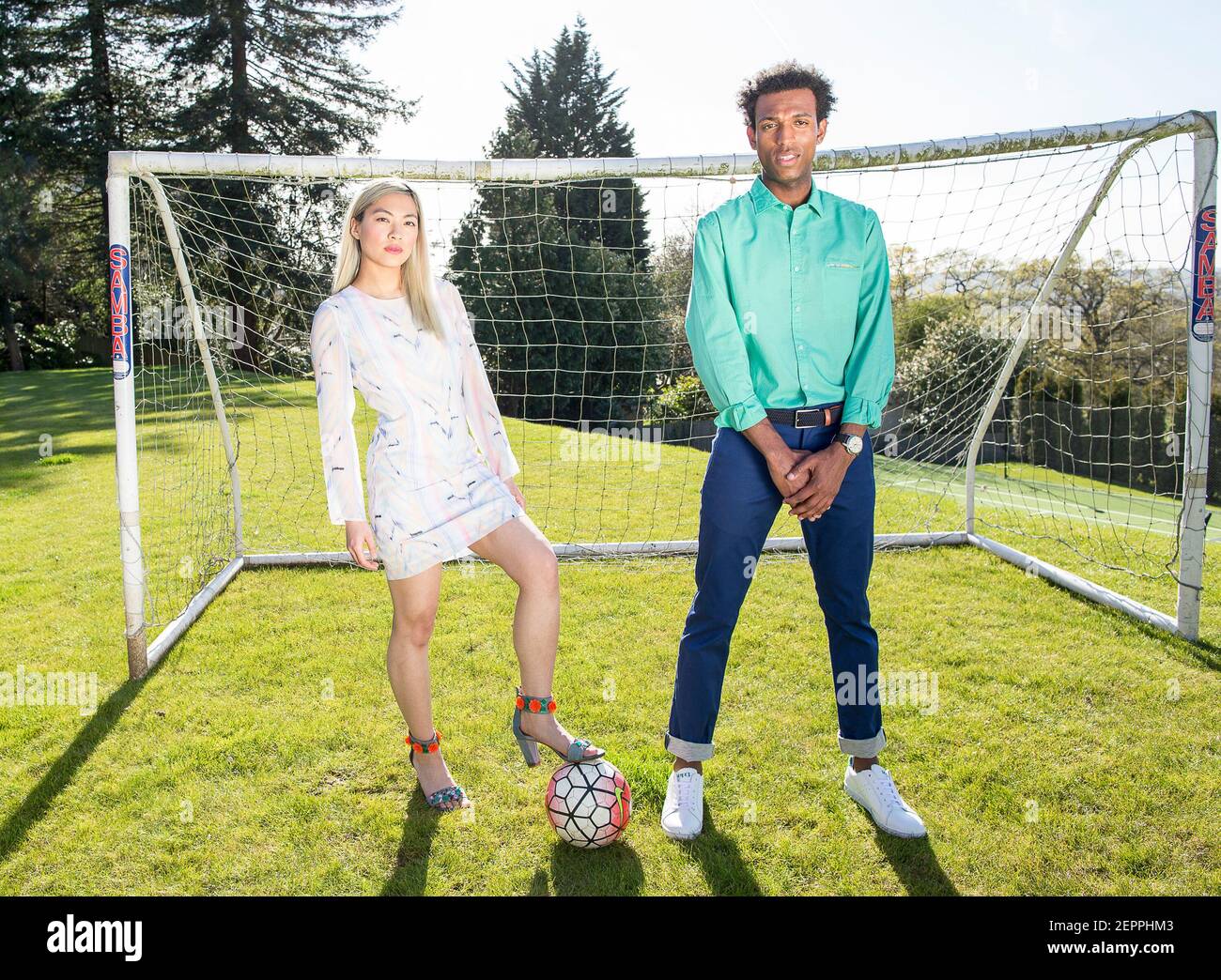 Football fashion story with a black male model and blonde Chinese ...