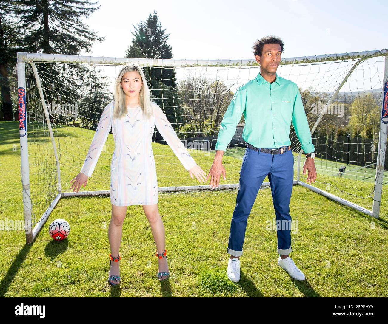 Football fashion story with a black male model and blonde Chinese ...