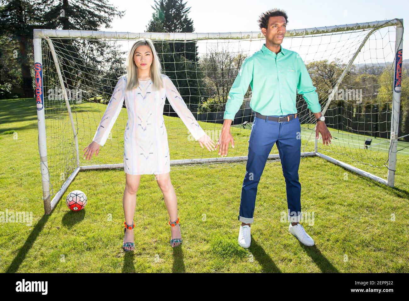 Football fashion story with a black male model and blonde Chinese ...