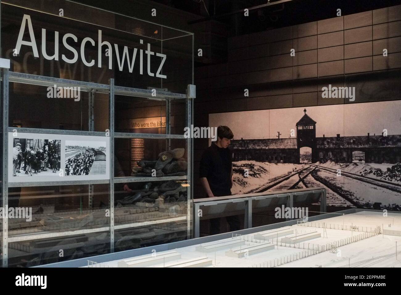 A man views the Holocaust Exhibition at the Imperial War Museum in ...