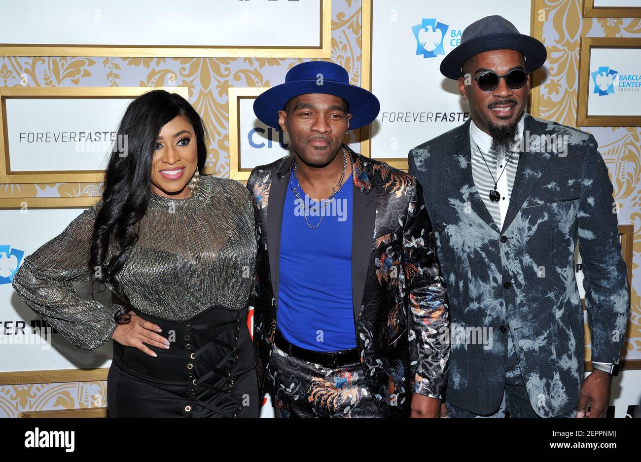 Angela Burgin, singer/songwriter Earnest Pugh and Keith Williams attend ...