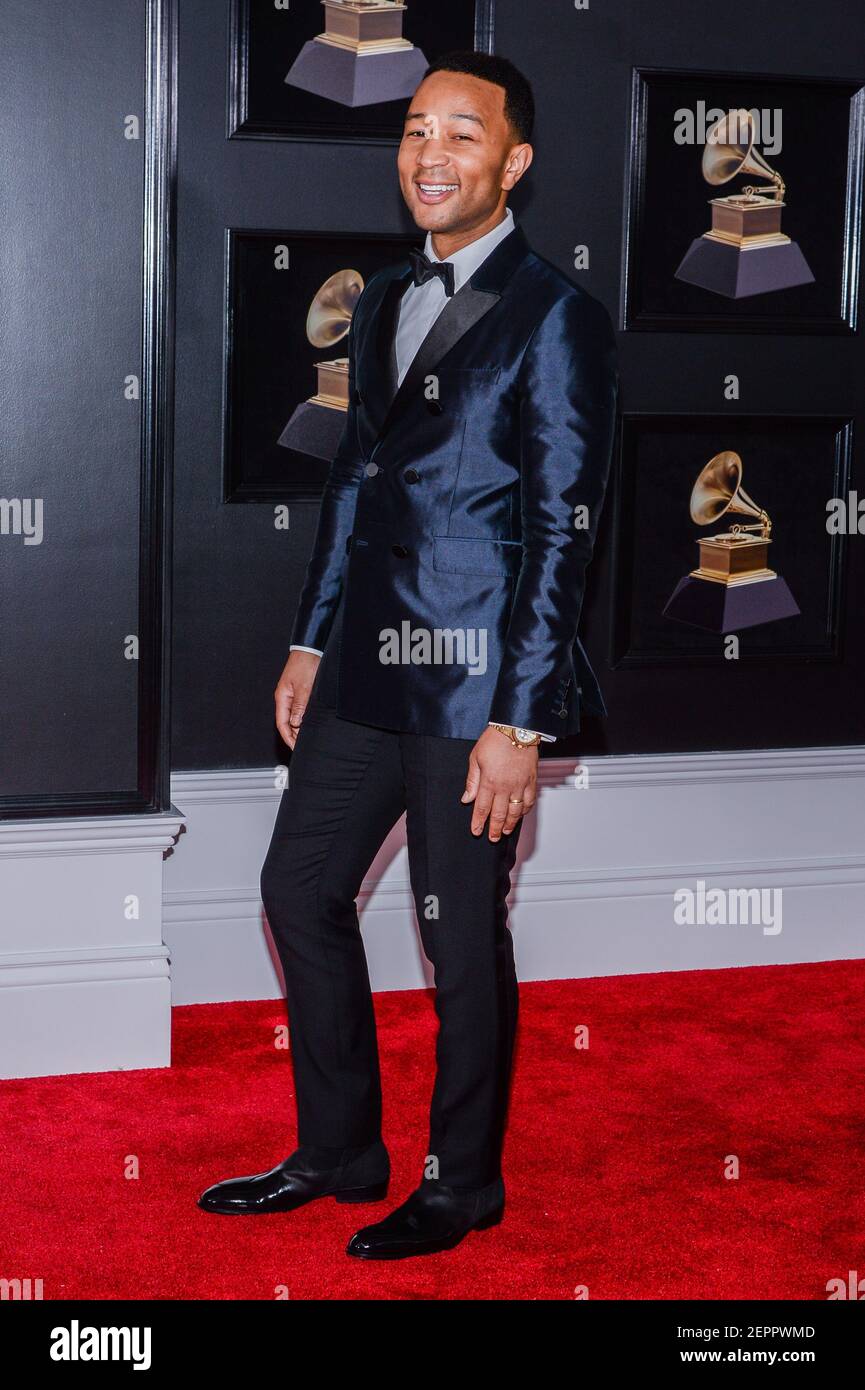 John Legend arrives at the 60th Annual GRAMMY Awards red carpet at ...