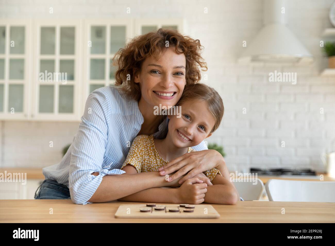 Child and foster parent hug hi-res stock photography and images - Alamy