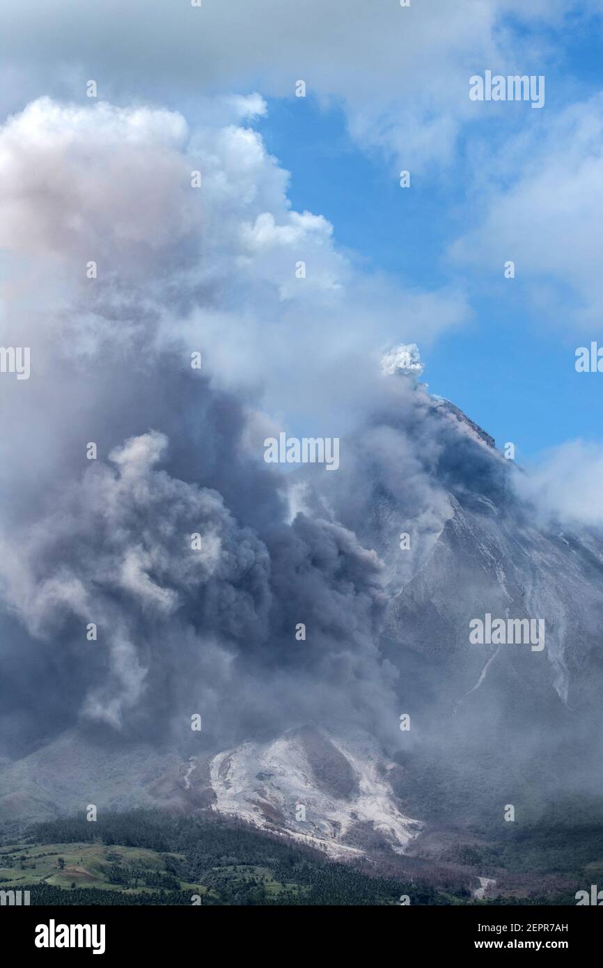 Mayon volcano spews ash as seen from Daraga in Albay province, south of ...