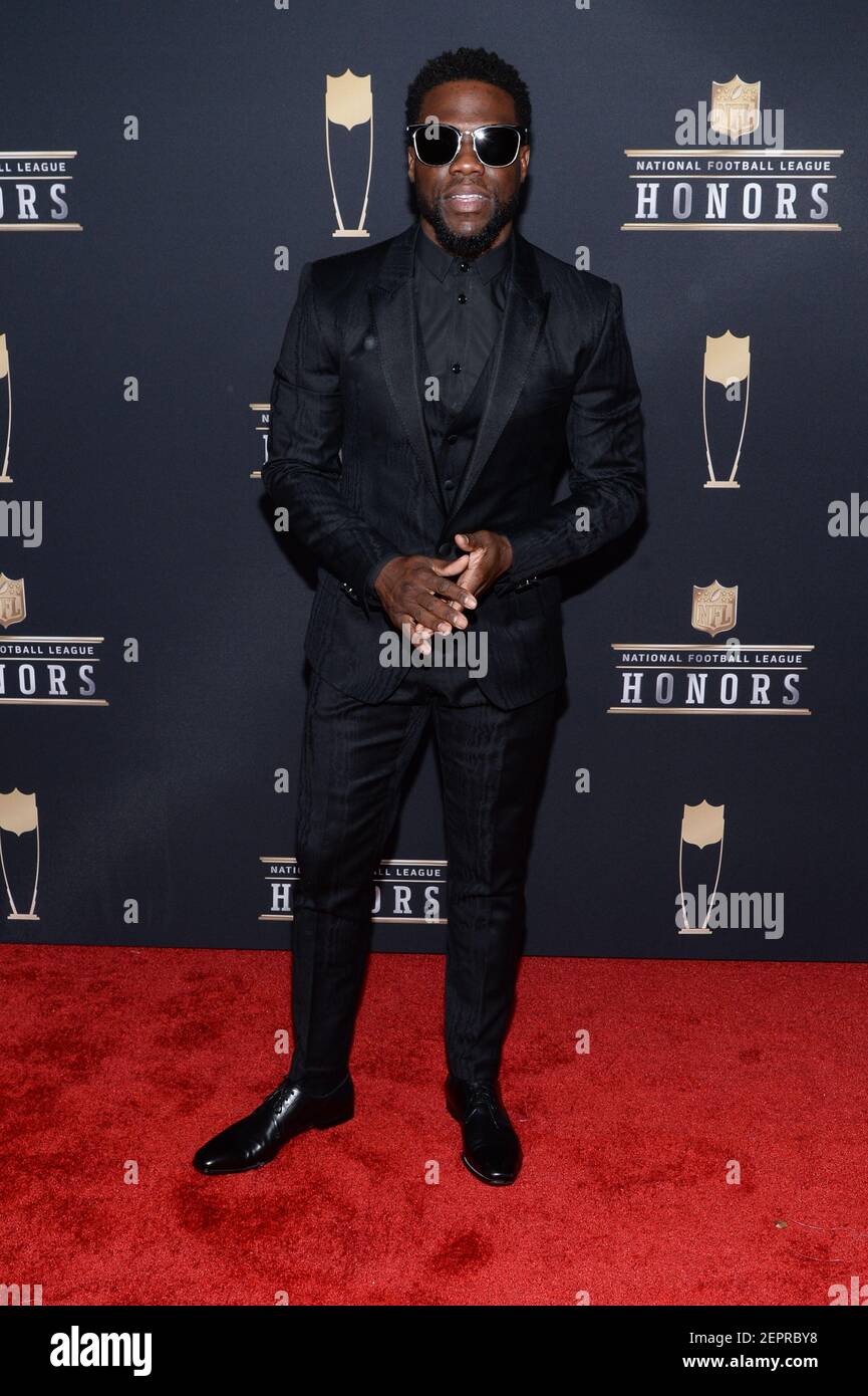 Kevin Hart walking on the red carpet the NFL Honors held at the Cyrus ...