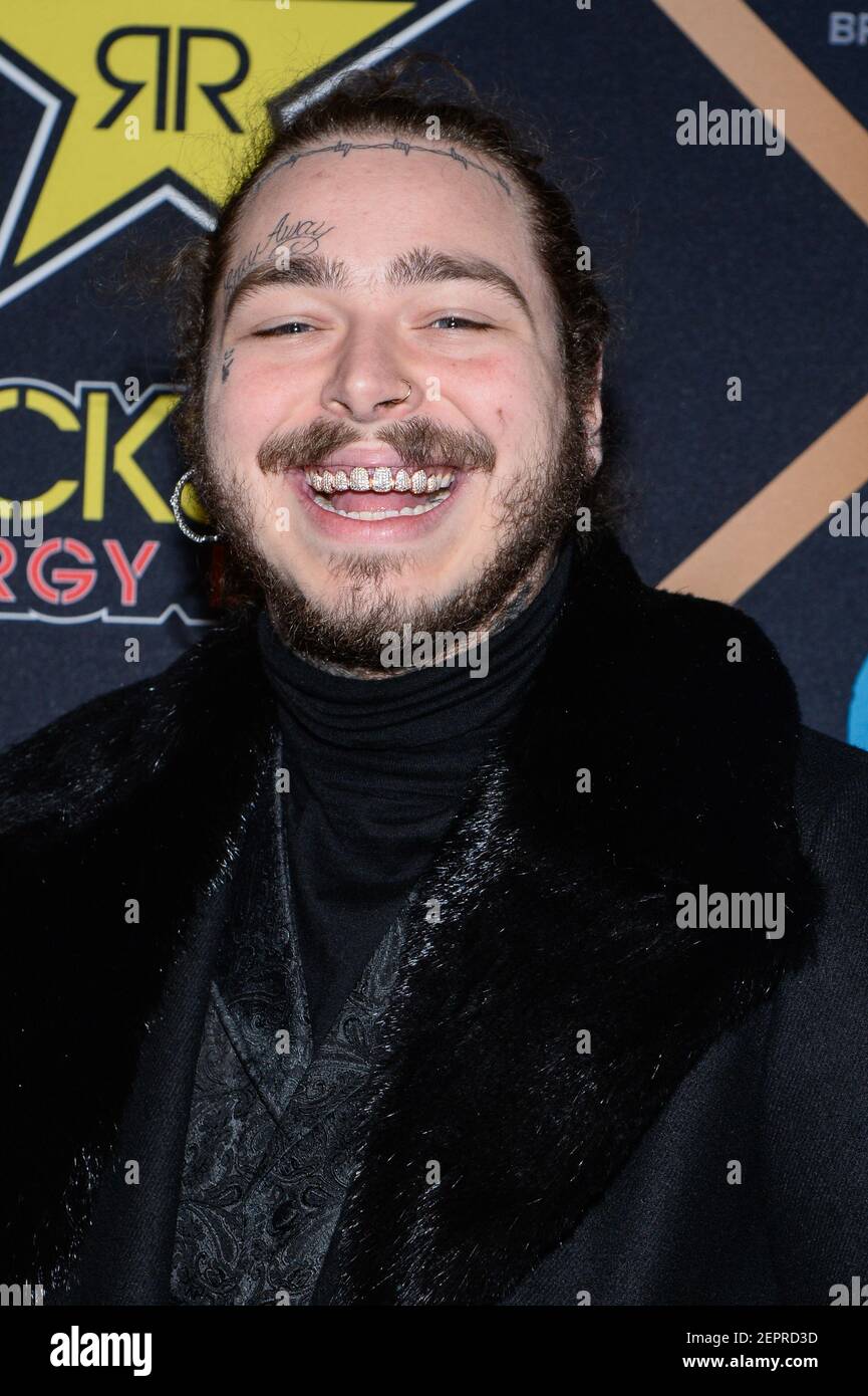 Post Malone walking on the red carpet at the The 2018 MAXIM Party held ...