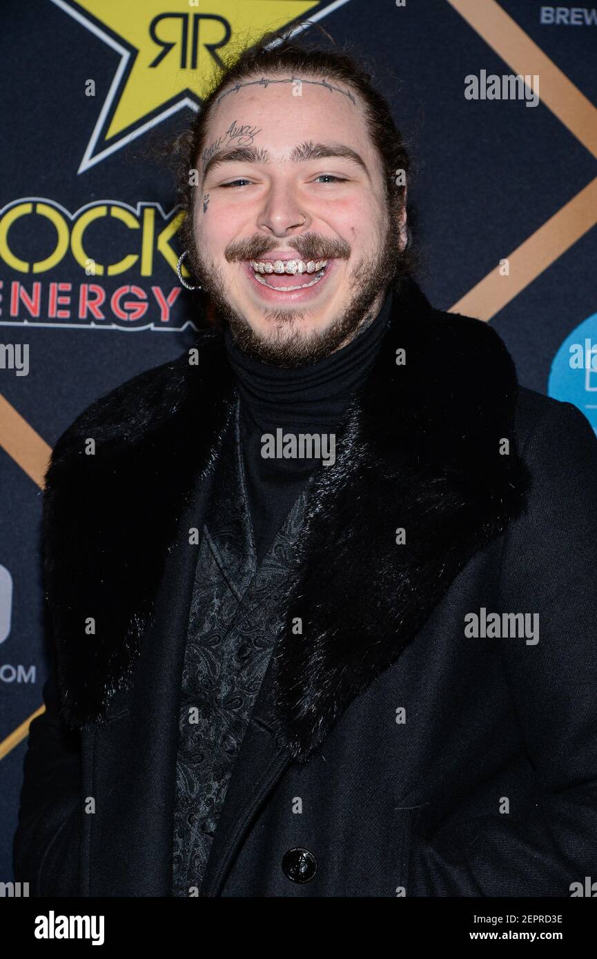 Post Malone walking on the red carpet at the The 2018 MAXIM Party held ...