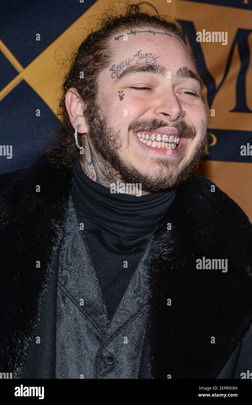 Post Malone walking on the red carpet at the The 2018 MAXIM Party held ...