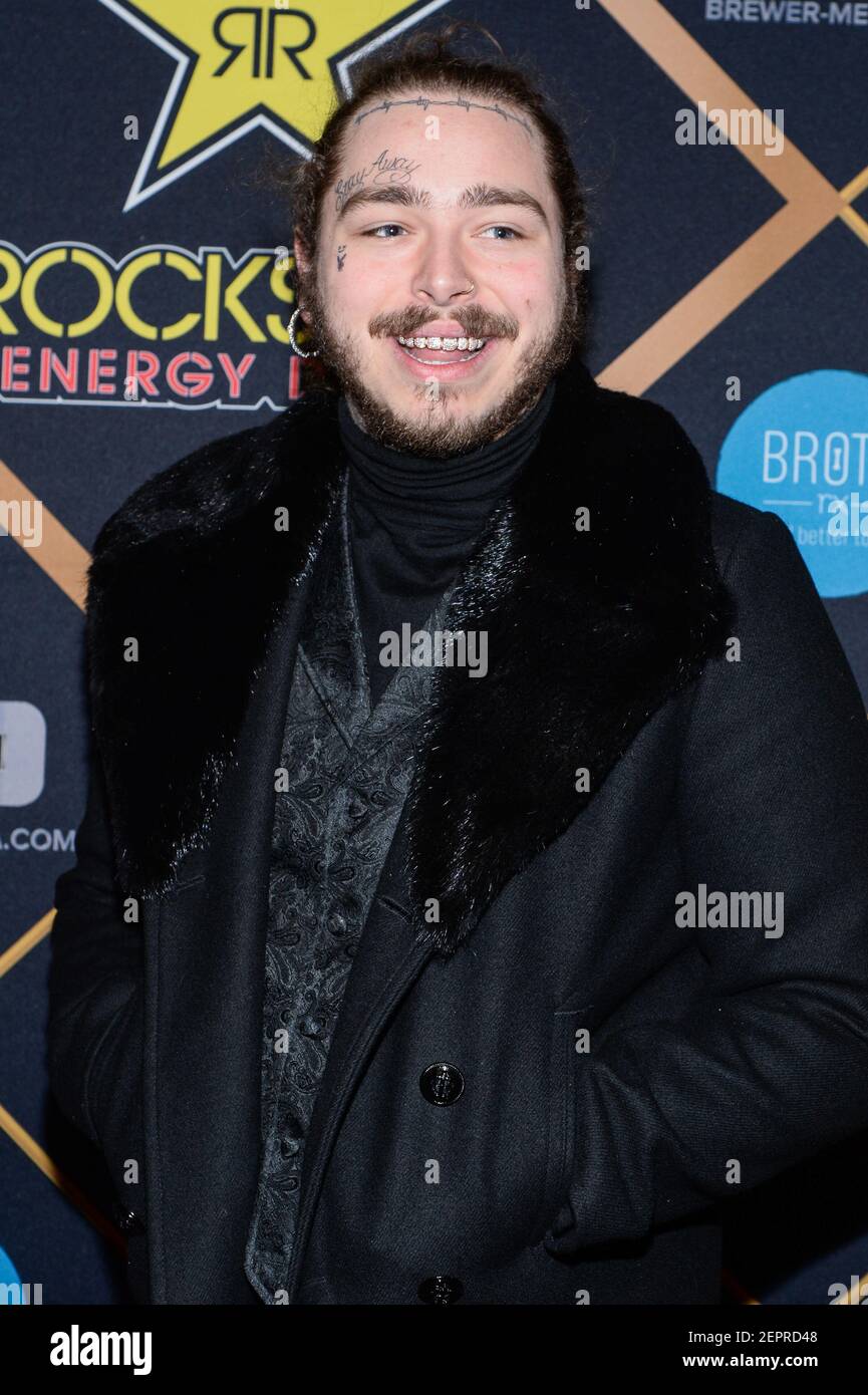 Post Malone walking on the red carpet at the The 2018 MAXIM Party held ...