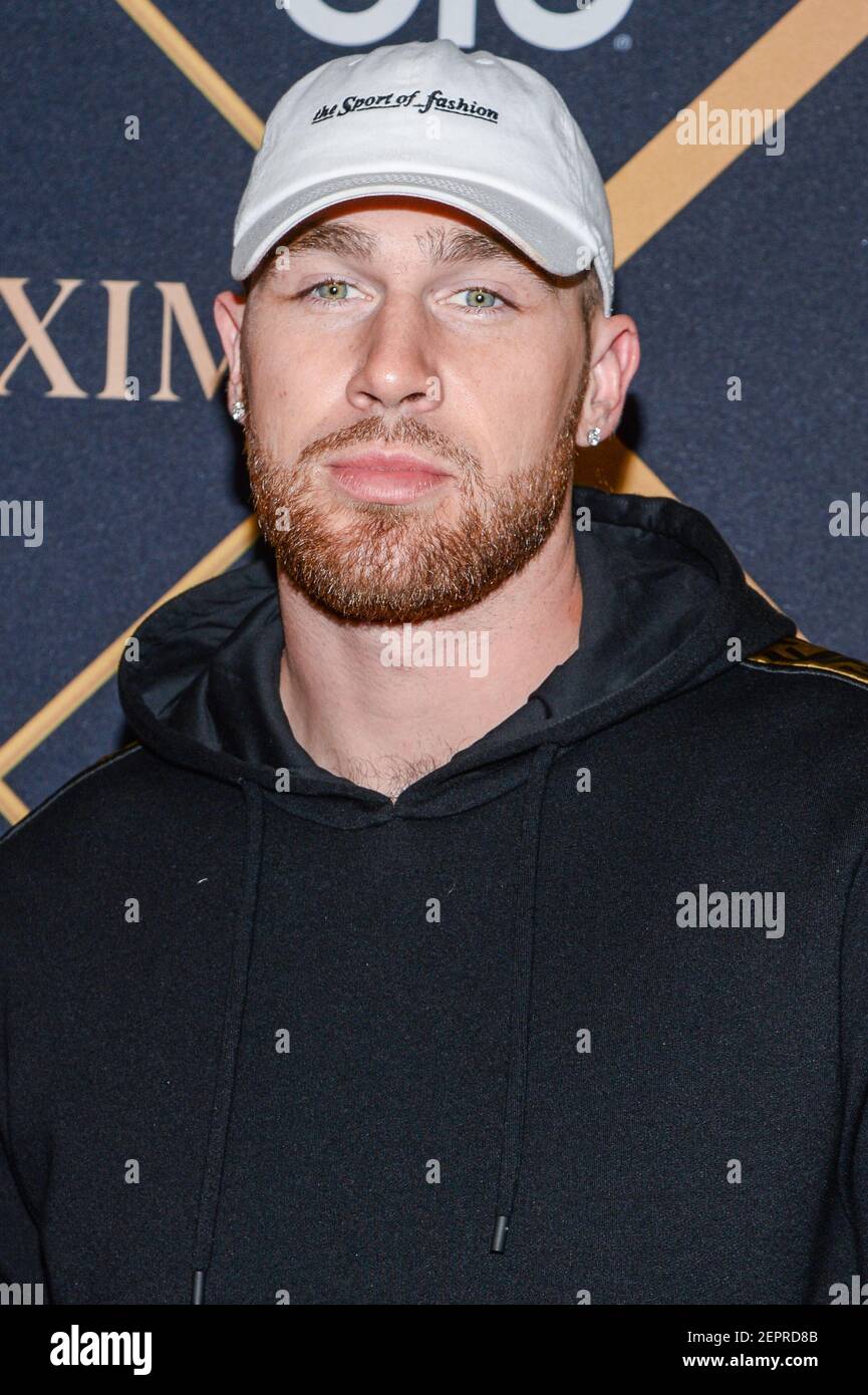 Travis Kelce walking on the red carpet at the The 2018 MAXIM Party held ...
