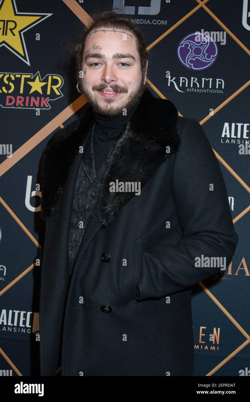 Post Malone walking on the red carpet at the The 2018 MAXIM Party held ...