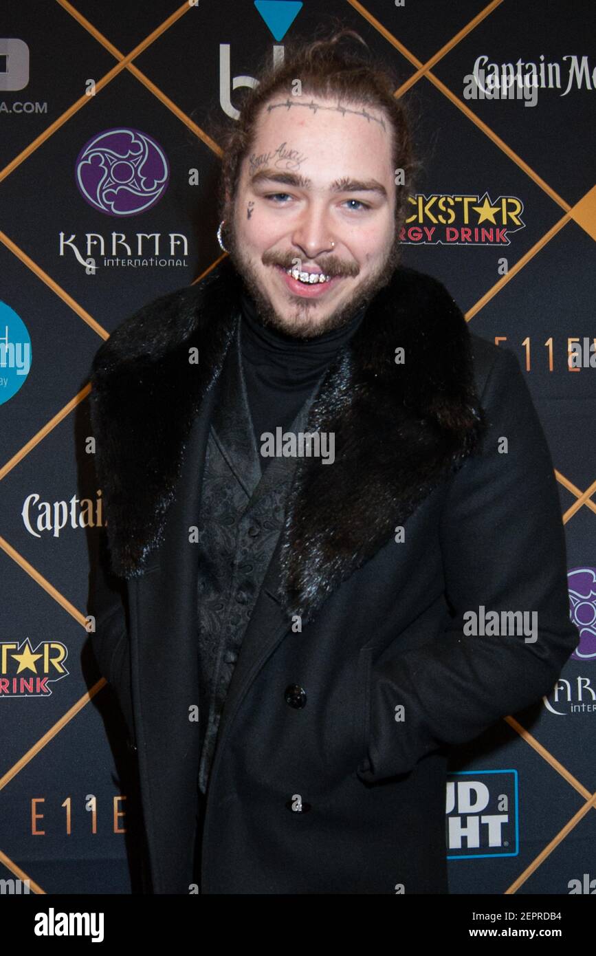 Post Malone walking on the red carpet at the The 2018 MAXIM Party held ...
