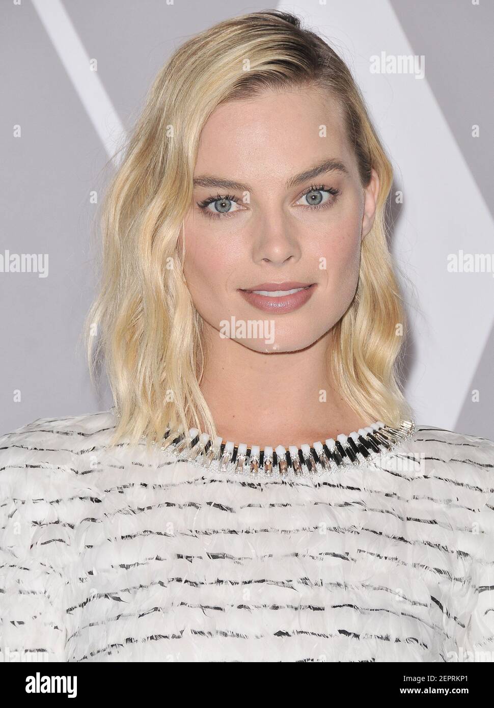 Margot Robbie arrives at the 90th Annual Academy Awards Nominee ...