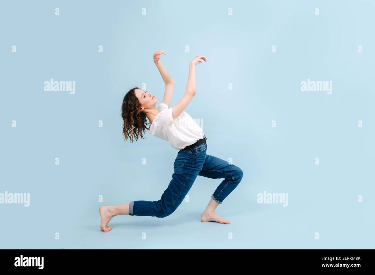 Beautiful young woman arching back hi-res stock photography and images ...