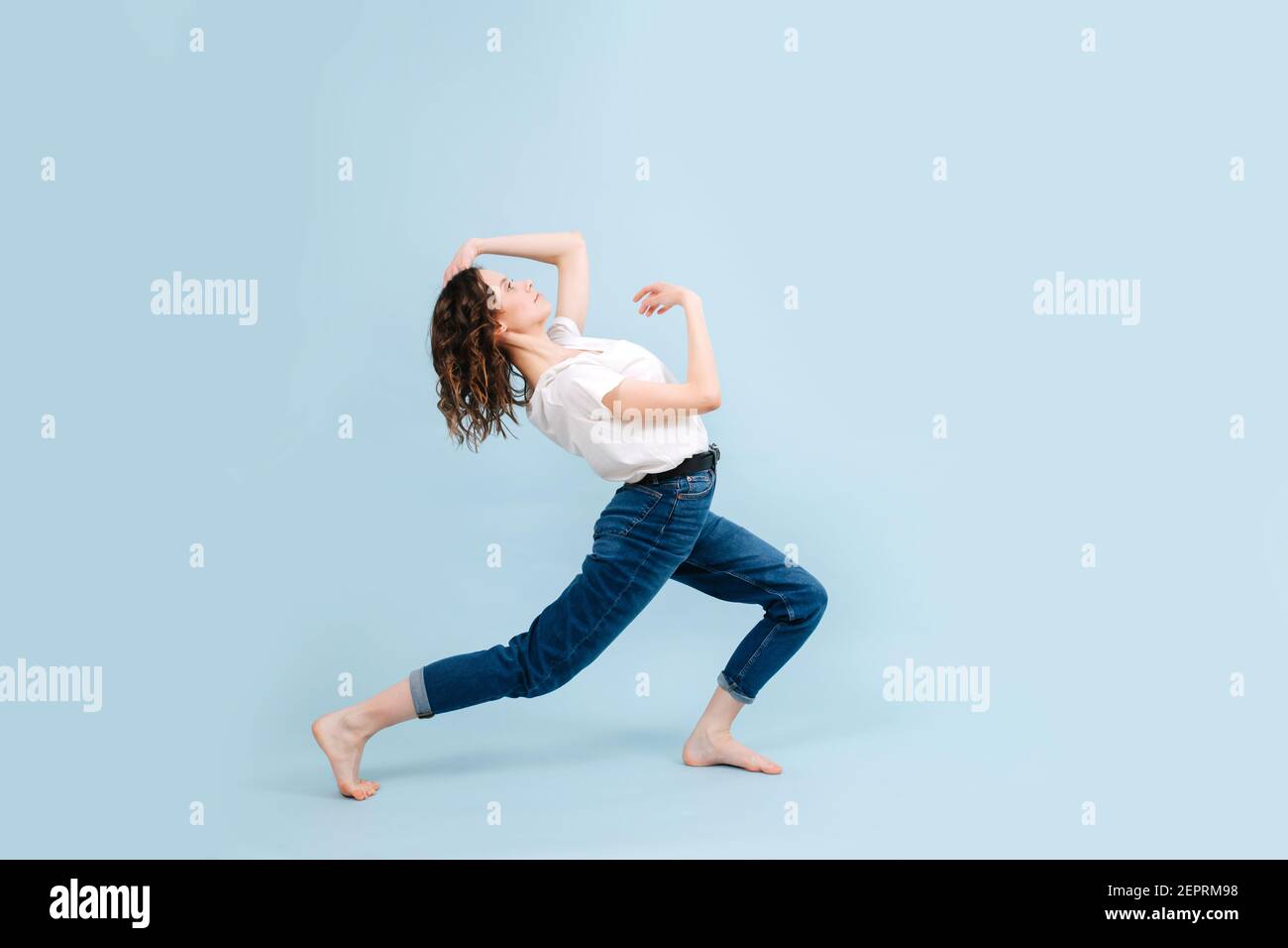Beautiful young woman arching back hi-res stock photography and images ...