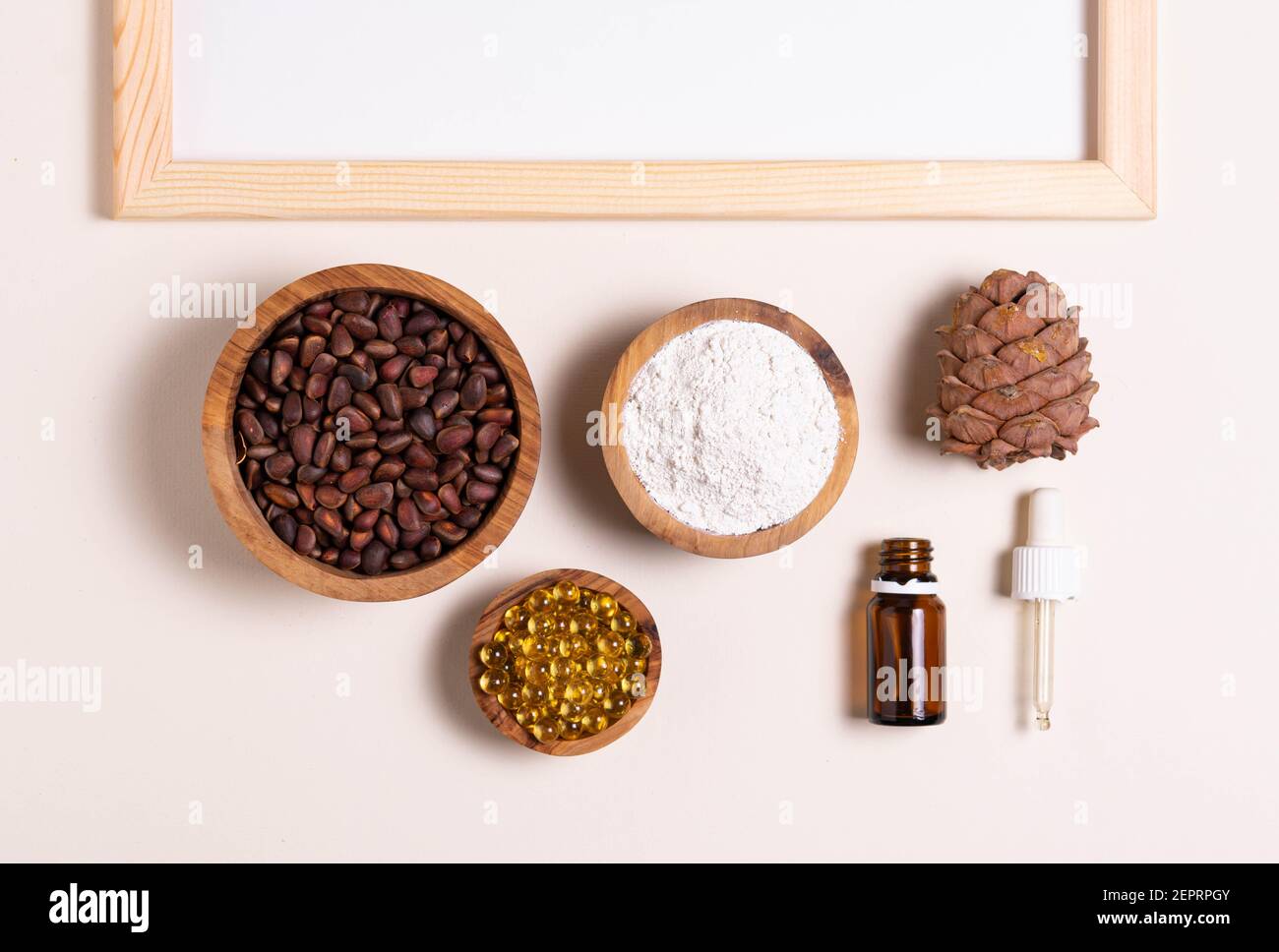 Natural product concept, template for writing text. Pine nuts, oil ...