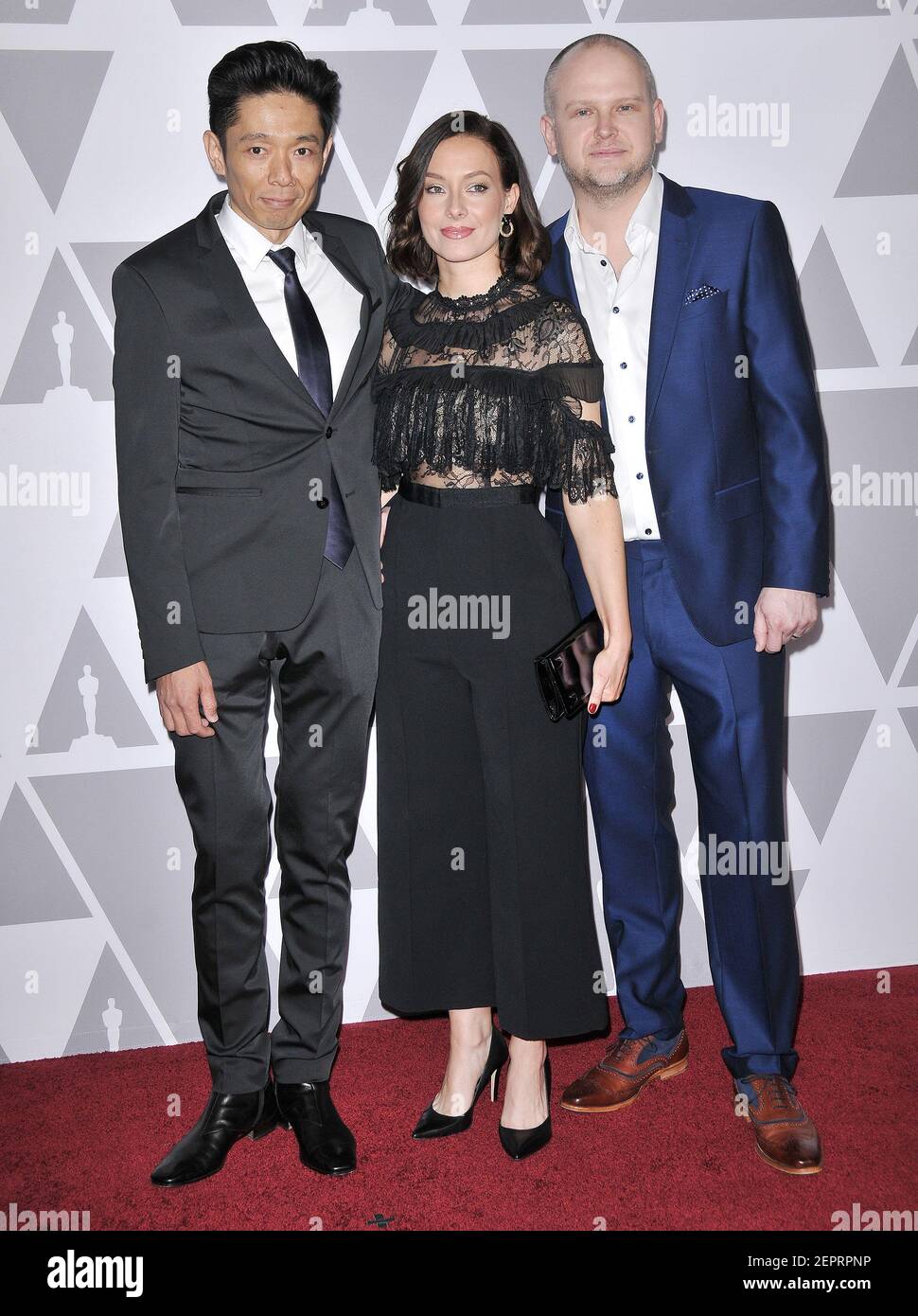(L-R) Kazuhiro Tsuji, Lucy Sibbick, and David Malinowski arrives at the ...
