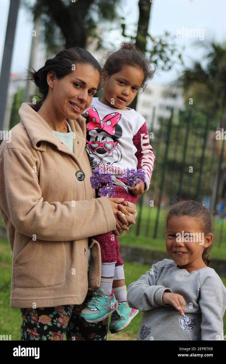 Esperanza Tello holds her baby, Ediangelis Alexandra Rojas, and poses ...
