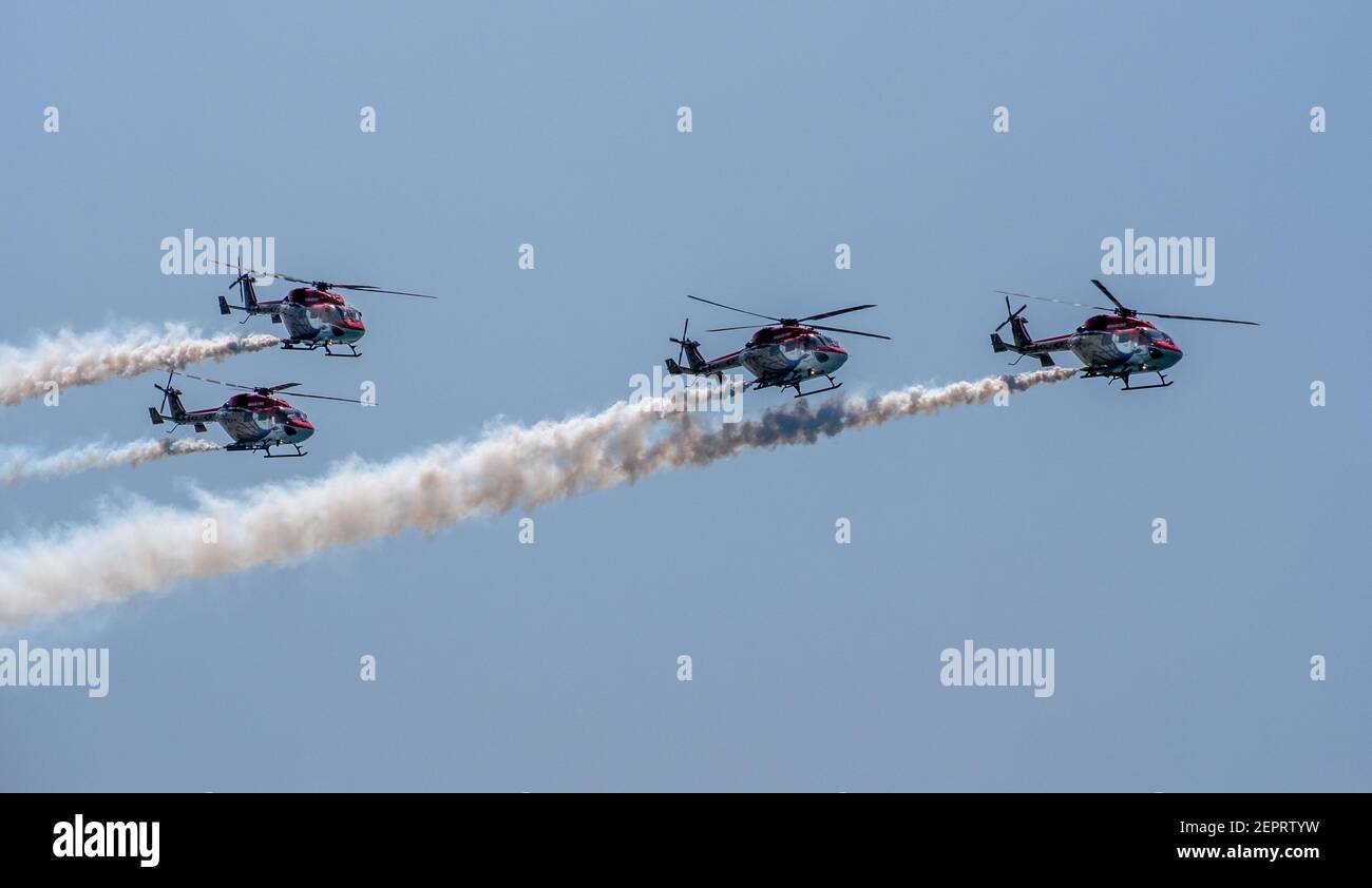 Indian Air Force Sarang helicopter air display team in formation flying ...