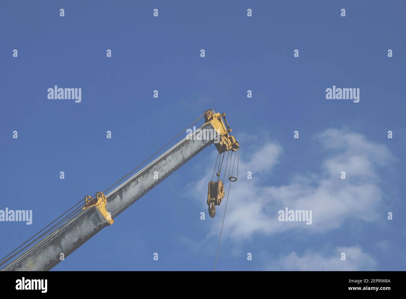 Telescopic Arm of a Mobile Crane against Blue Sky Stock Photo - Alamy