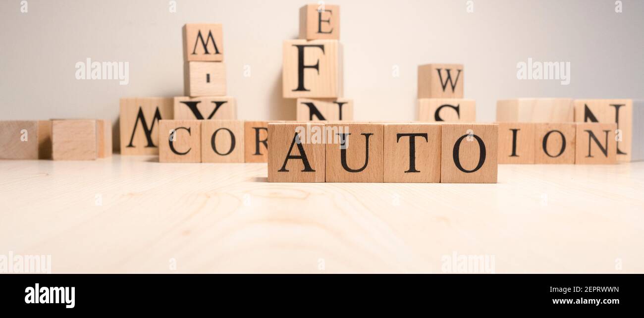 The word auto is from wooden cubes. Background from wooden letters ...