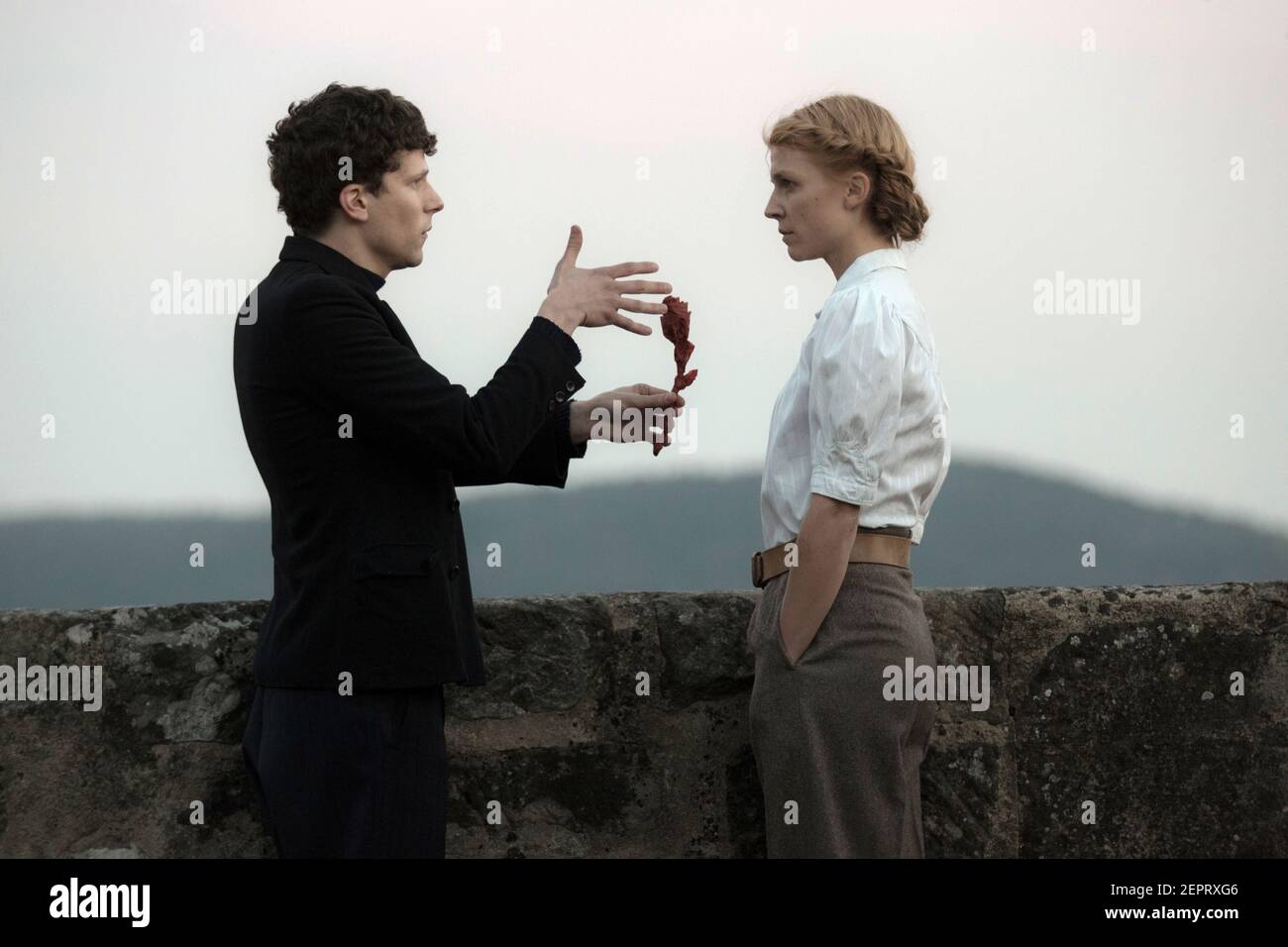 JESSE EISENBERG and CLEMENCE POESY in RESISTANCE (2020), directed by ...